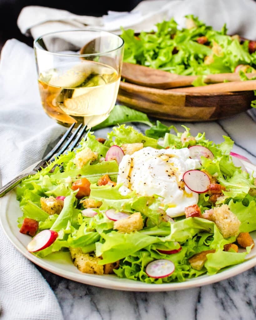 Frisée Salad with Lardons and Poached Eggs - Garlic & Zest
